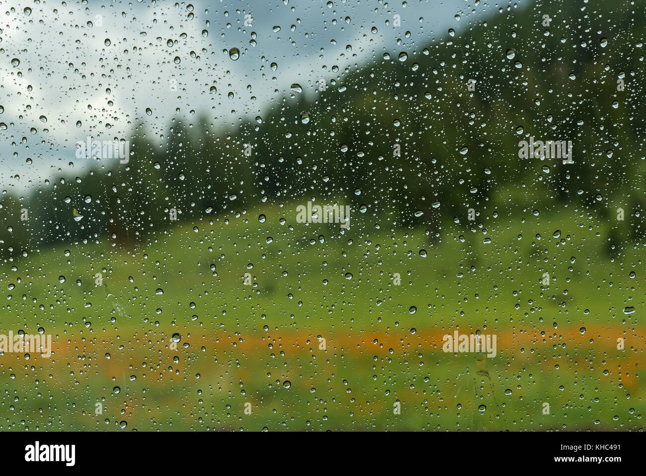 Mountain through wet window hi-res stock photography and images - Alamy