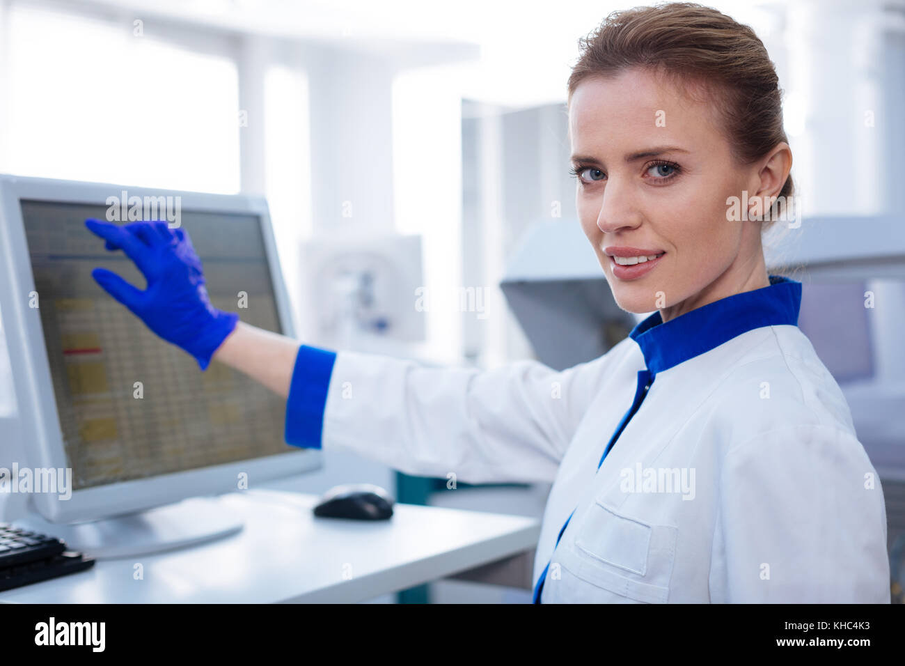 Beautiful genuine laboratorian working hard Stock Photo - Alamy