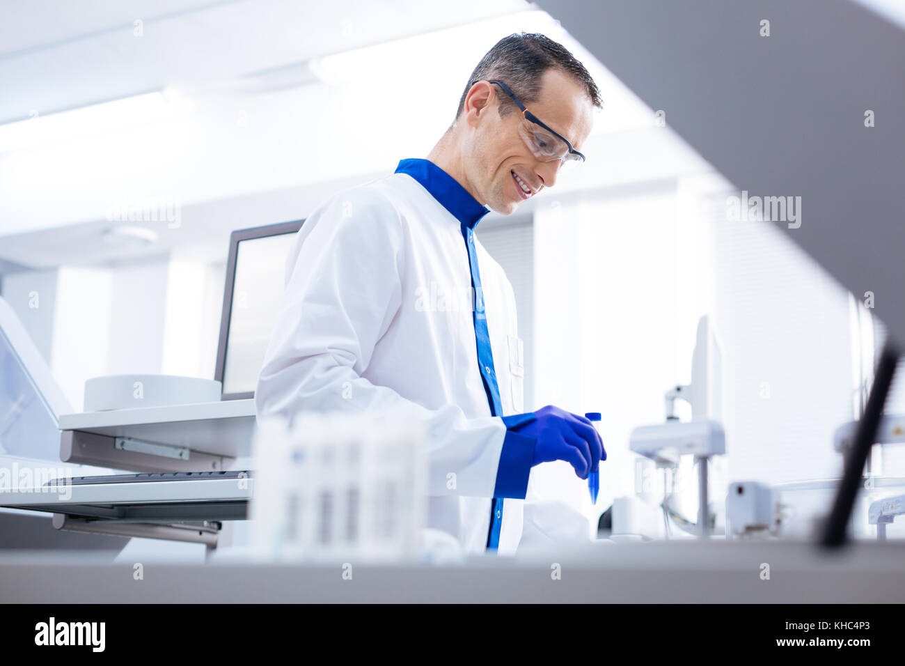 Handsome assistant hi-res stock photography and images - Alamy