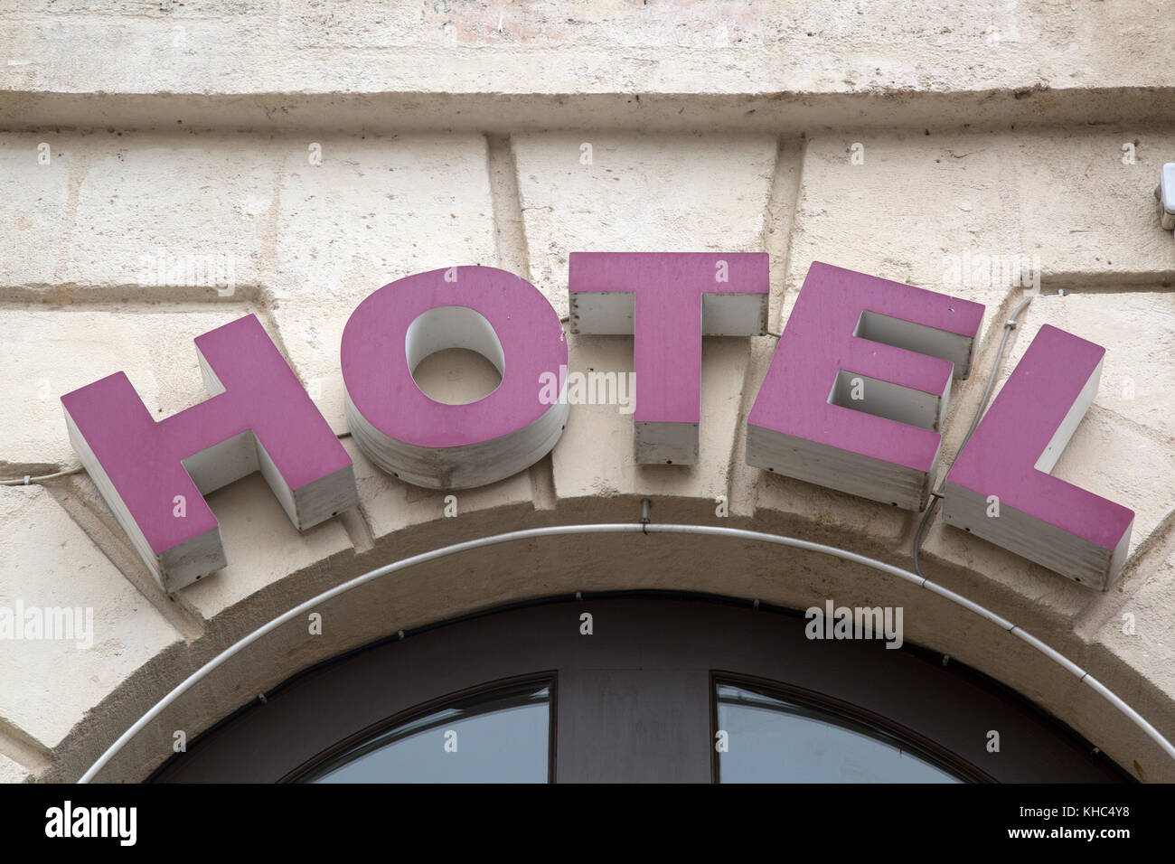 Hotel Sign on Building Facade Stock Photo - Alamy