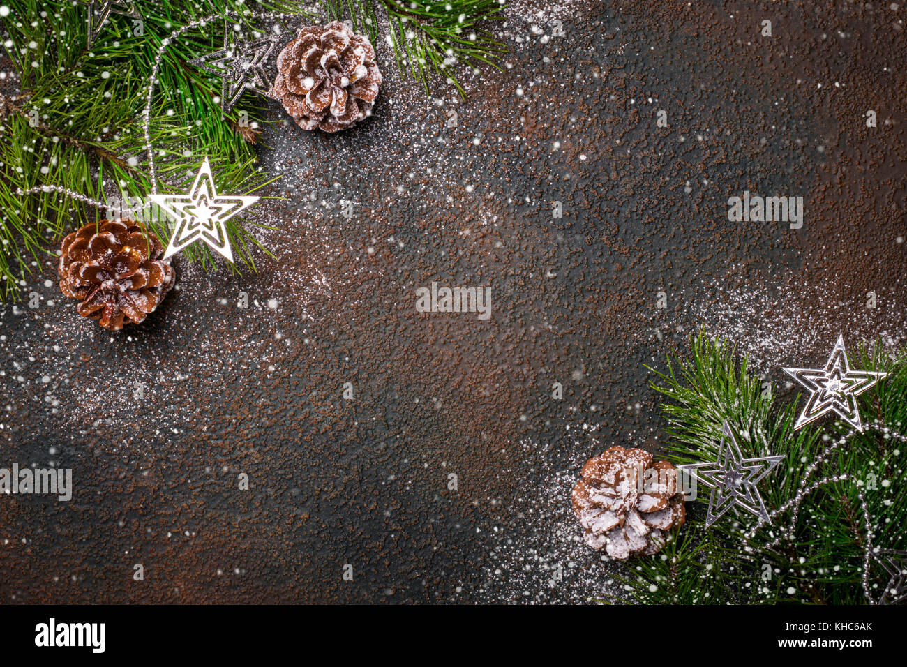 Christmas natural background with fir branches, cones and snow Stock ...