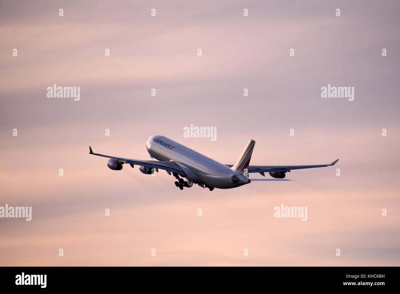 Takeoff at Sunset Stock Photo - Alamy