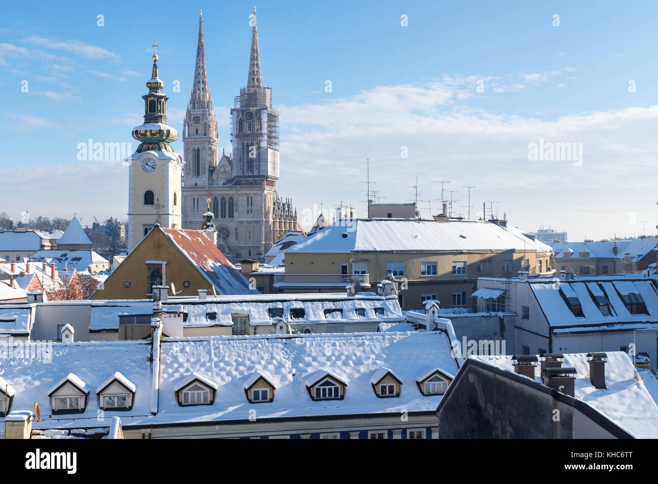 View over Zagreb during winter with snow with detail view to towers of ...