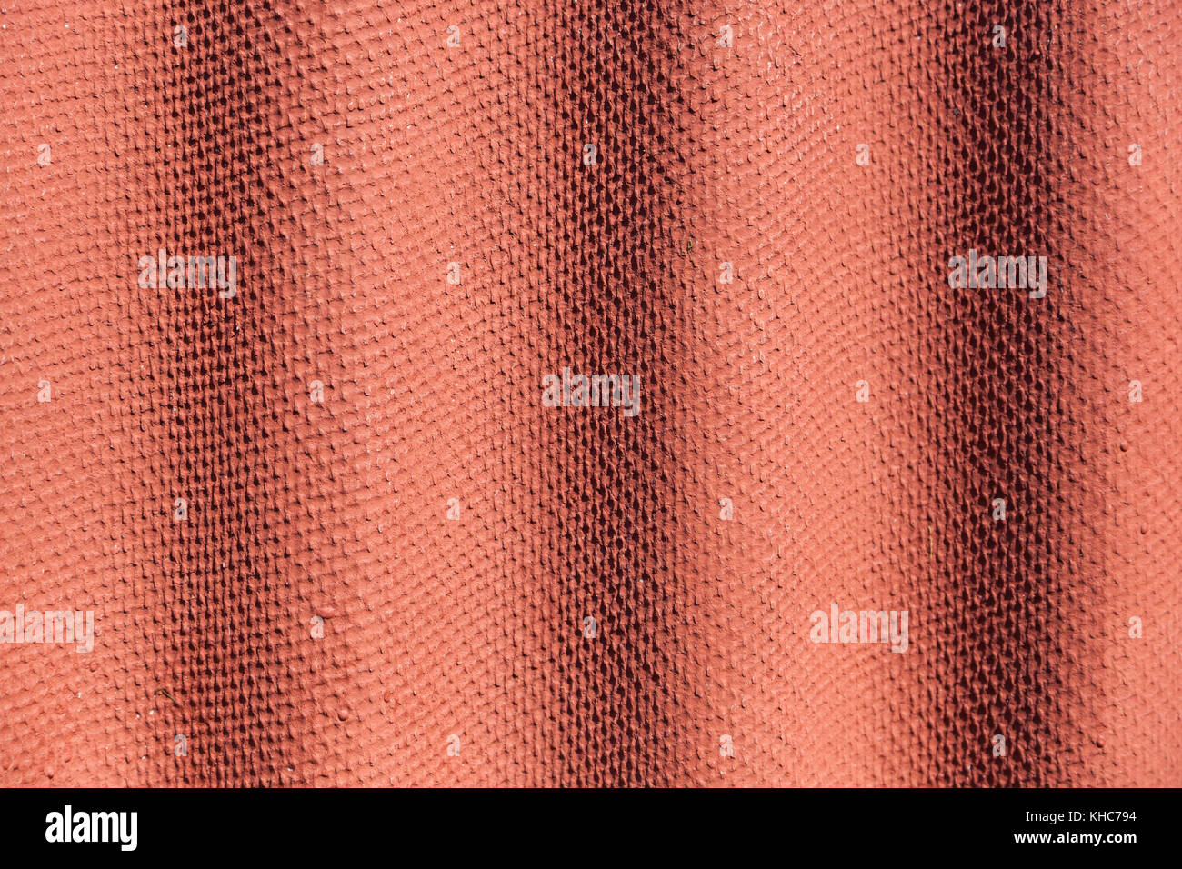 Fence Made Of Slate Red color background Stock Photo - Alamy