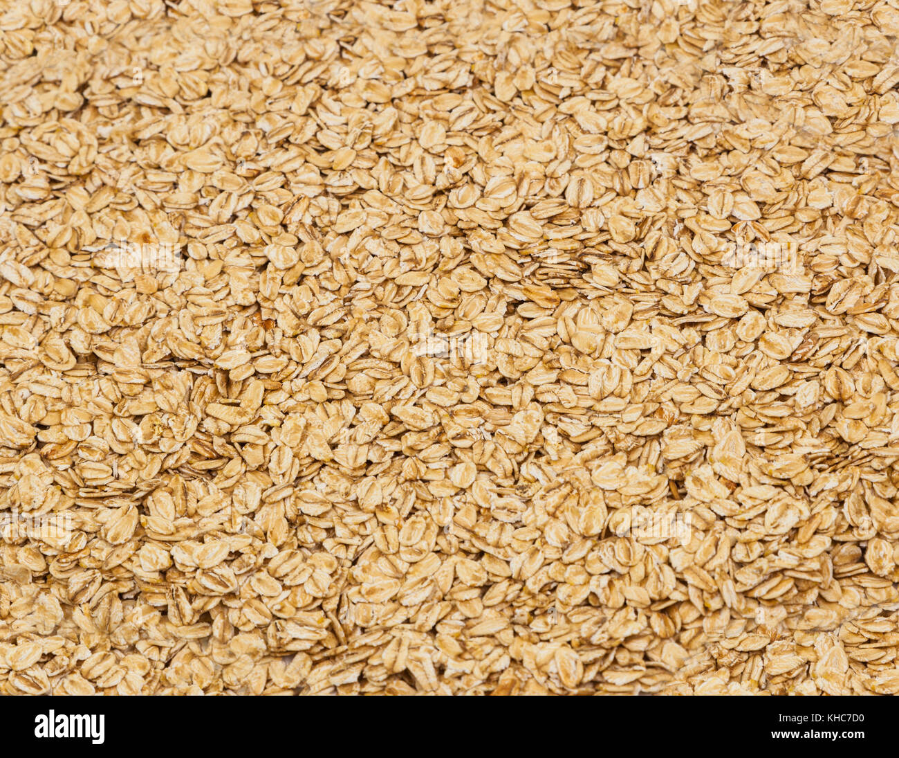 Surface coated with oatmeal flakes as a backdrop texture composition ...