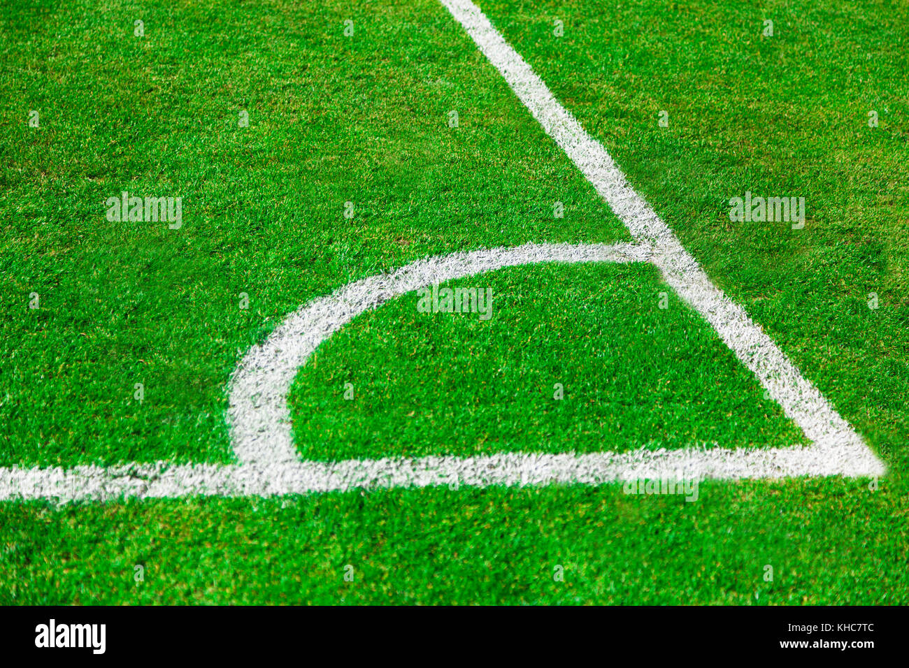White line Corner of the artificial grass soccer field Stock Photo - Alamy