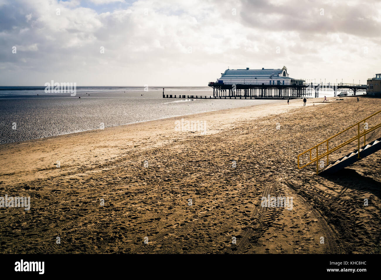 Cleethorpes pier in the background in a view of the promenade and beach ...