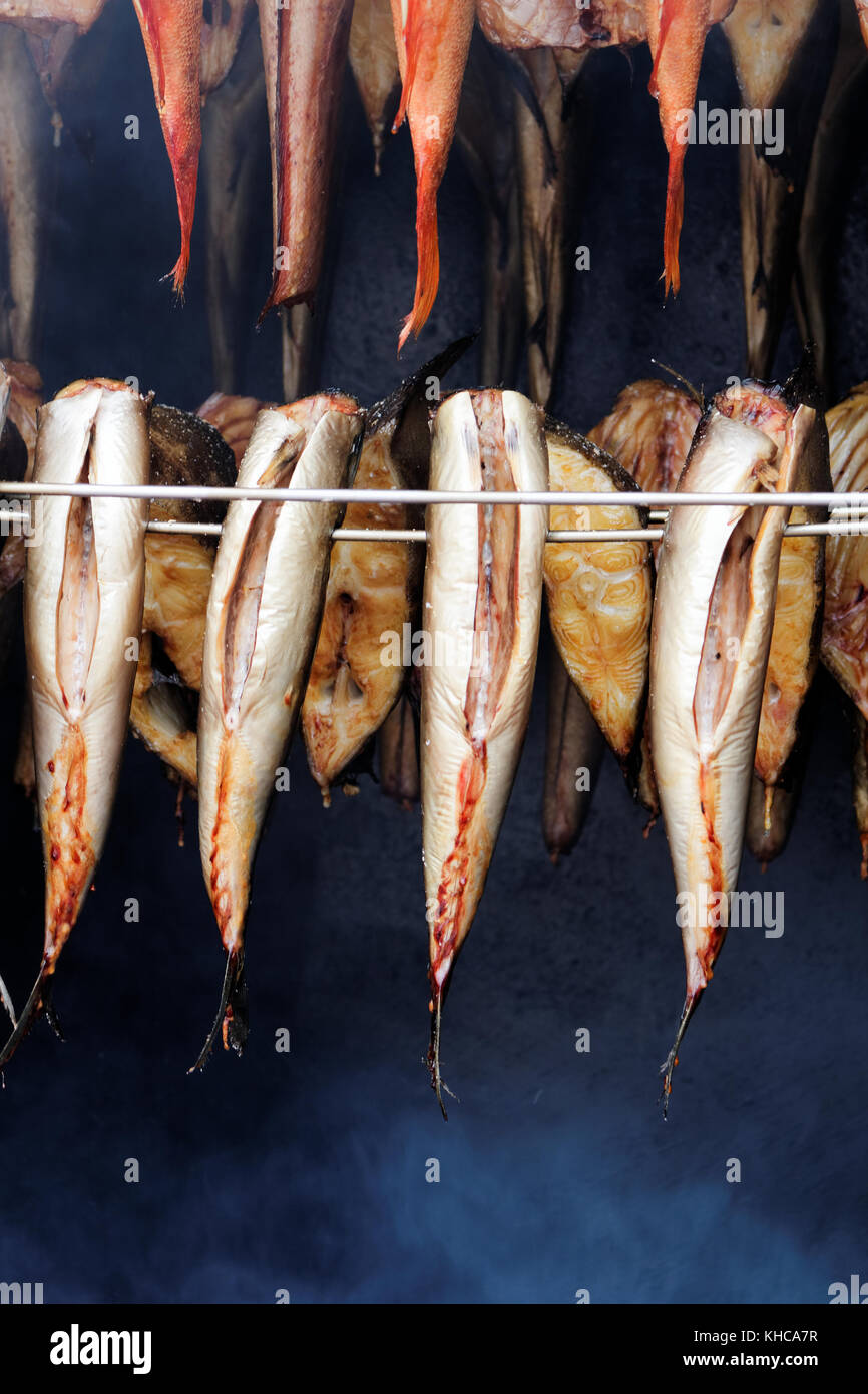 Smoked fish hanging in a smokehouse Stock Photo - Alamy