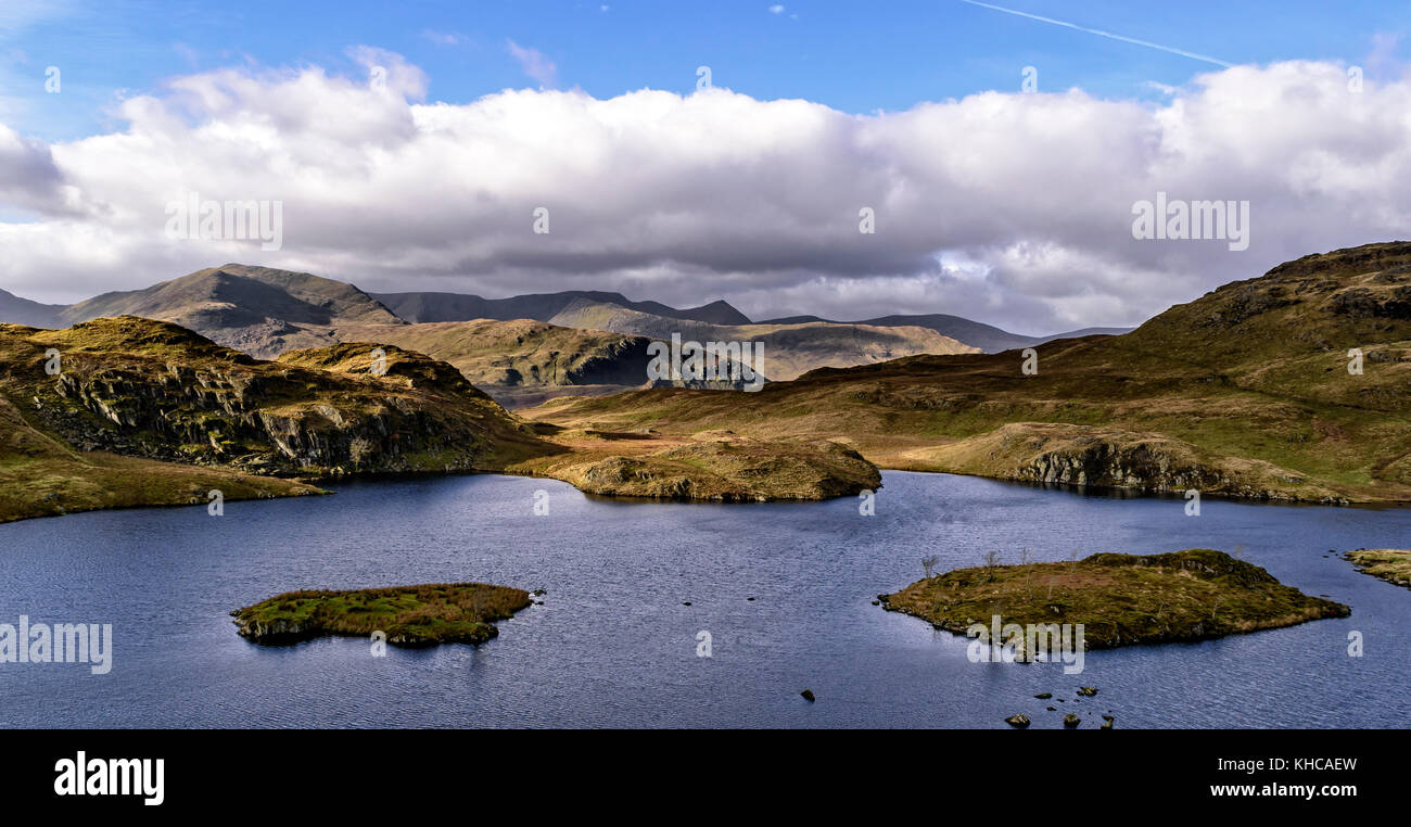 Wide-angled vie looking down on the lovely Angel Tarn with Helvellyn ...