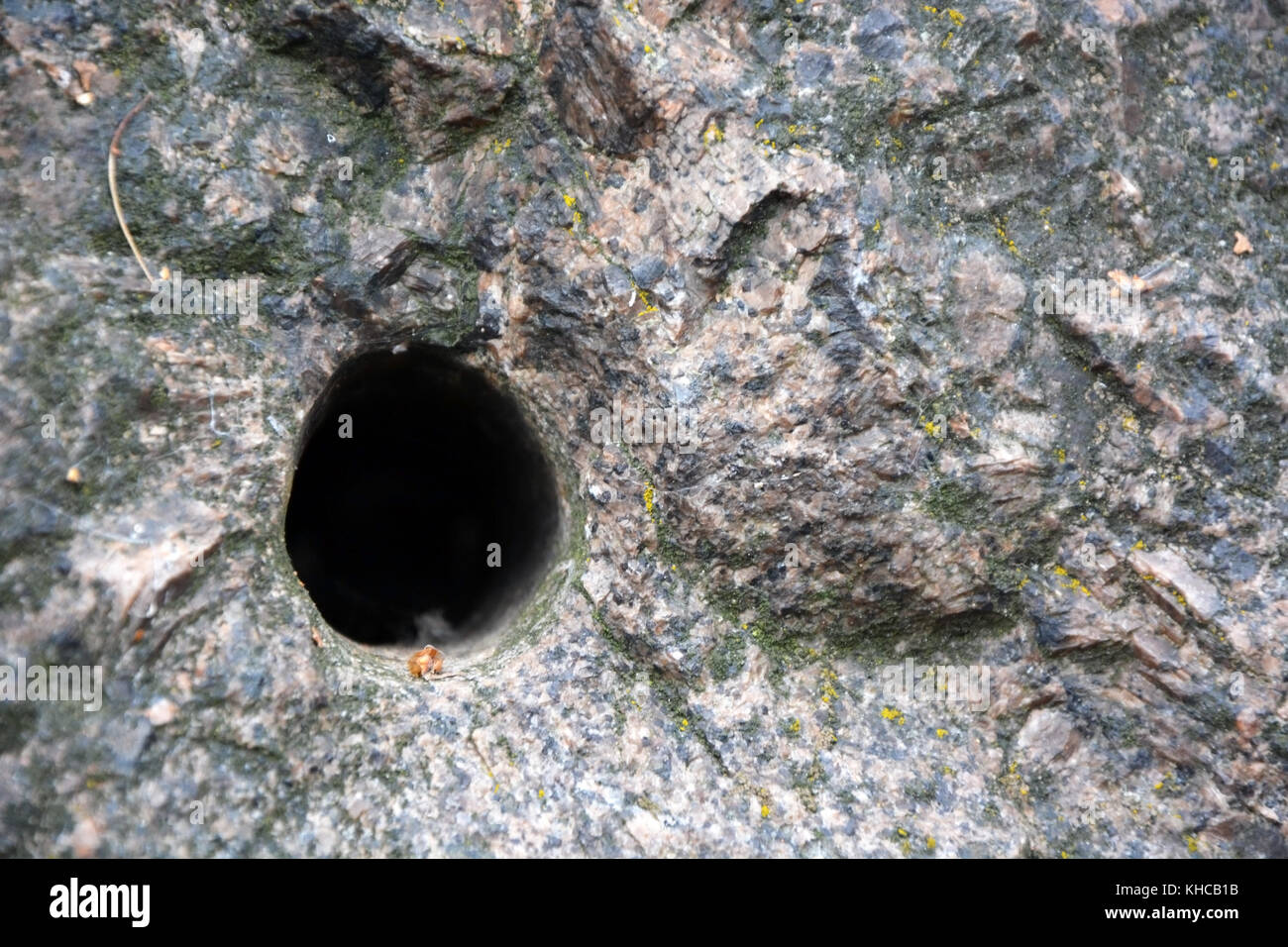 Hole in the stone. Picture can be used as a background Stock Photo - Alamy