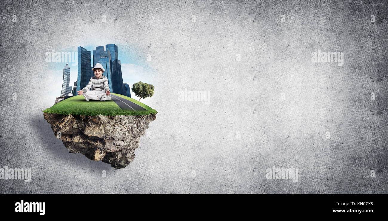 Little boy keeping mind conscious Stock Photo - Alamy