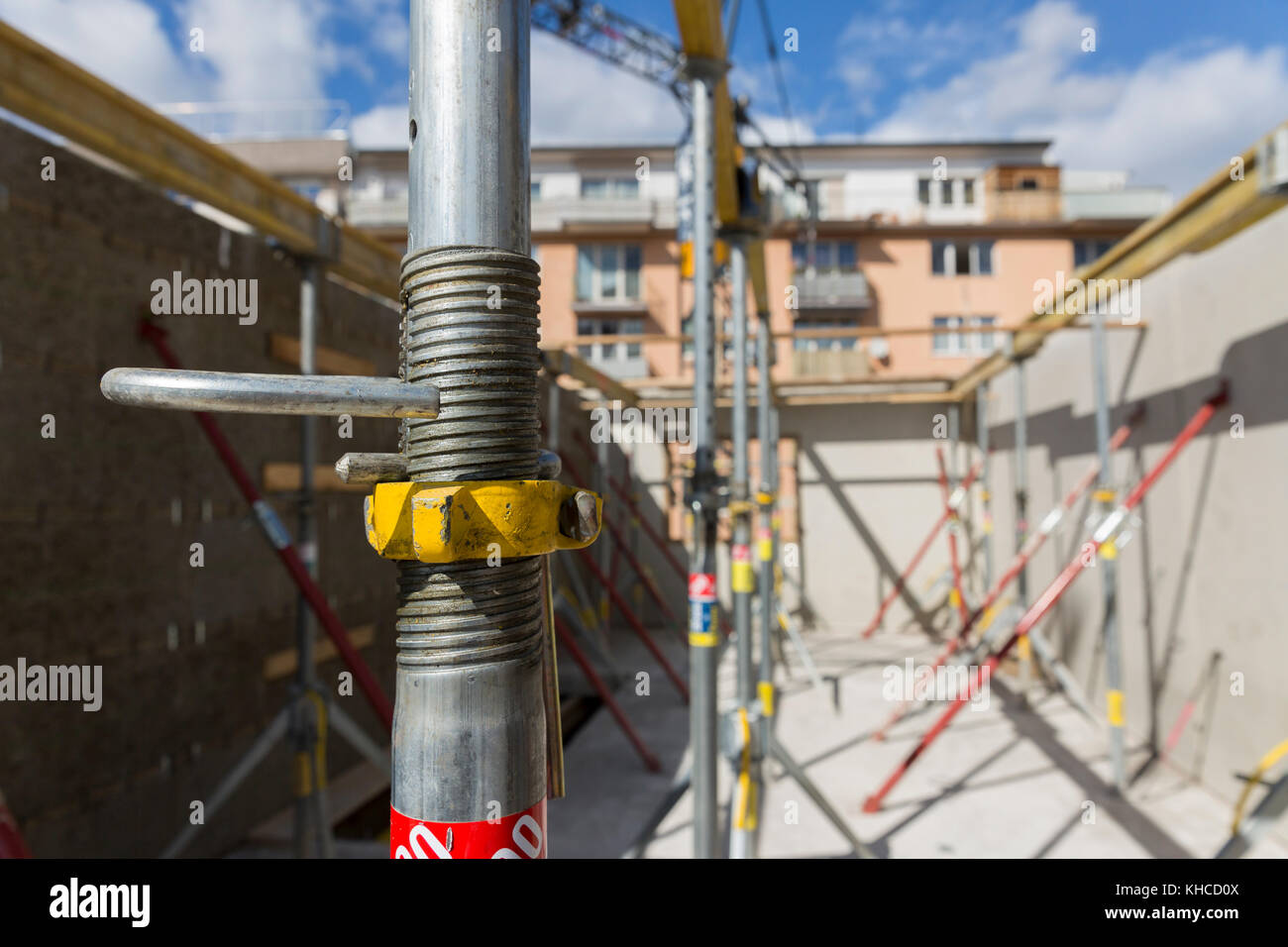 Scaffolding and concrete formwork. Building site of an apartment ...