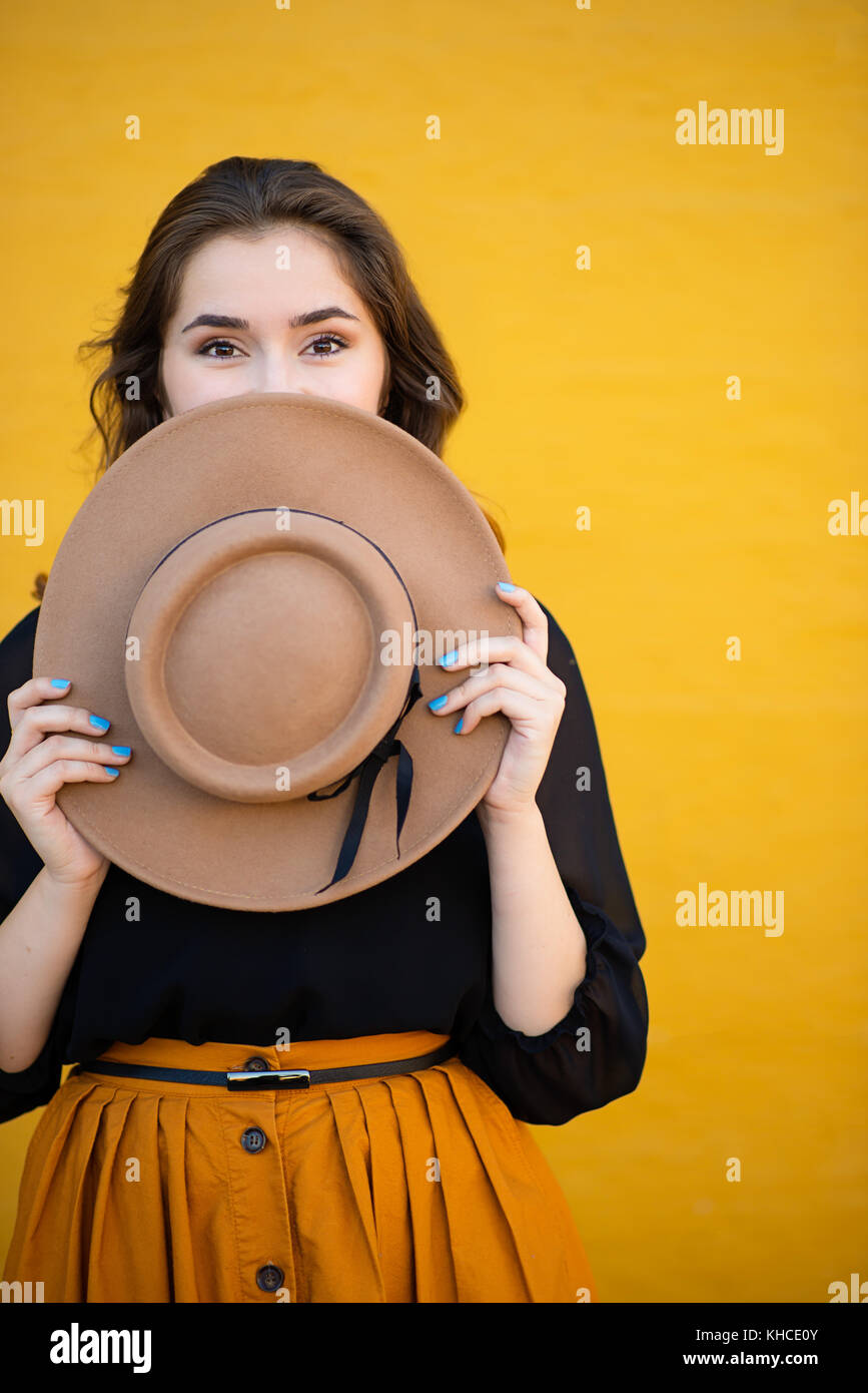 Hiding behind hat hi-res stock photography and images - Alamy