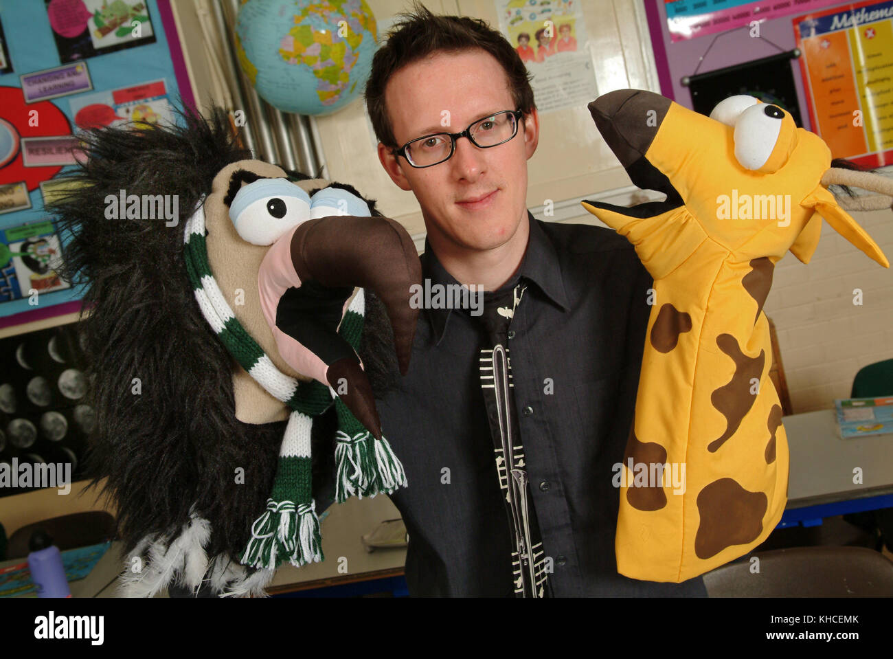 Teacher David Millington uses puppets, Gerald the Giraffe and Vinny the ...
