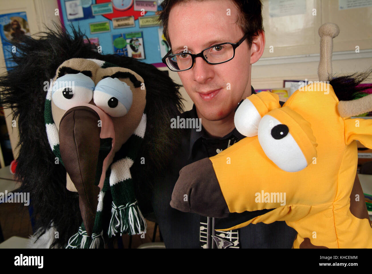 Teacher David Millington uses puppets, Gerald the Giraffe and Vinny the ...
