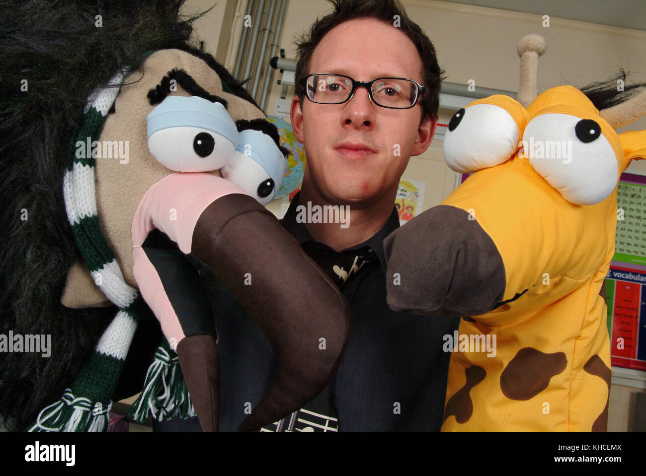 Teacher David Millington uses puppets, Gerald the Giraffe and Vinny the ...