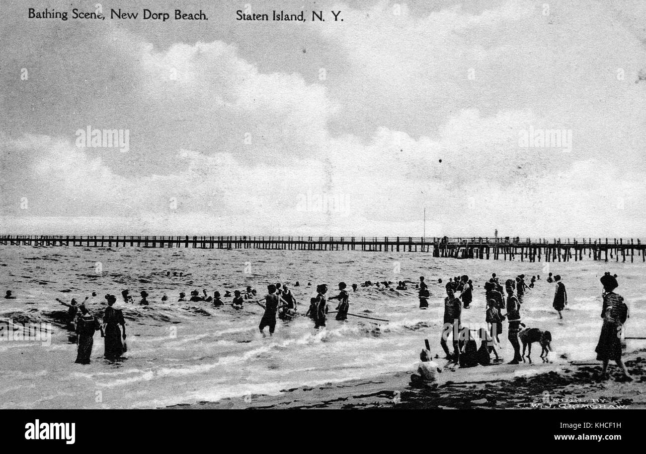 Postcard of beach scene photo with people bathing, long pier off beach ...