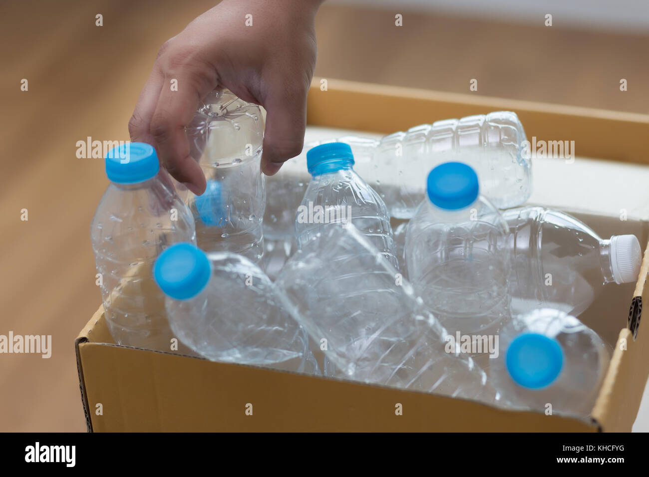 man hand putting plastic reuse for recycling concept environmental ...