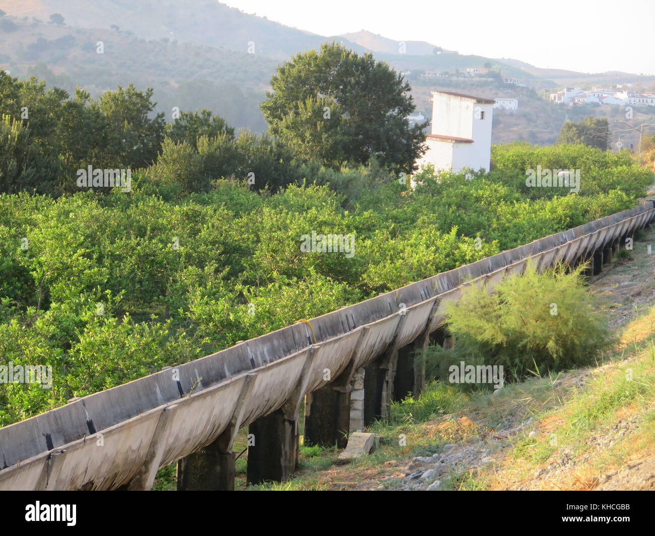 Elevated Concrete irrigation canal winding through countryside near ...