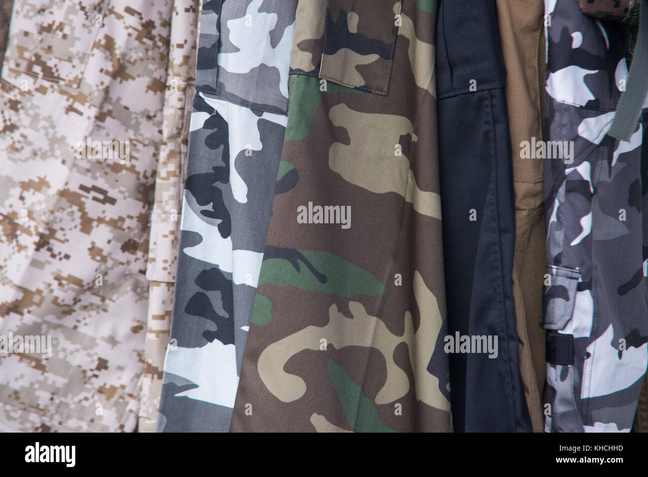 close up on mixed camo clothing of army Stock Photo - Alamy