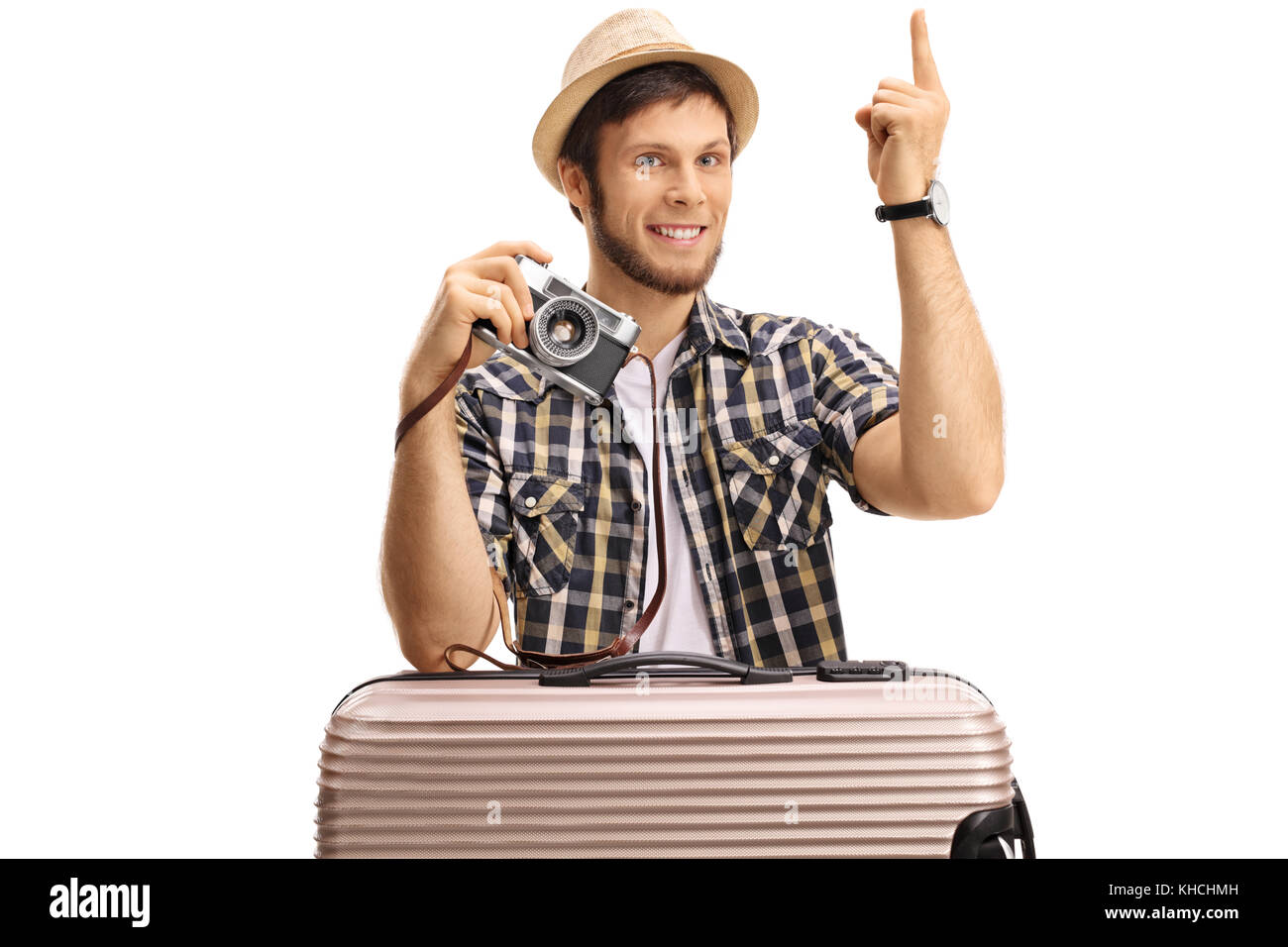 Tourist with a suitcase and a camera pointing up isolated on white ...