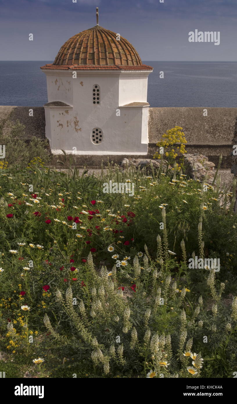 Byzantine chapel with masses of spring flowers, especially white ...