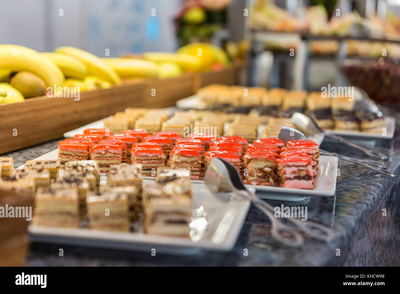 Pastry dessert buffet with fruits in the background in a five stars ...