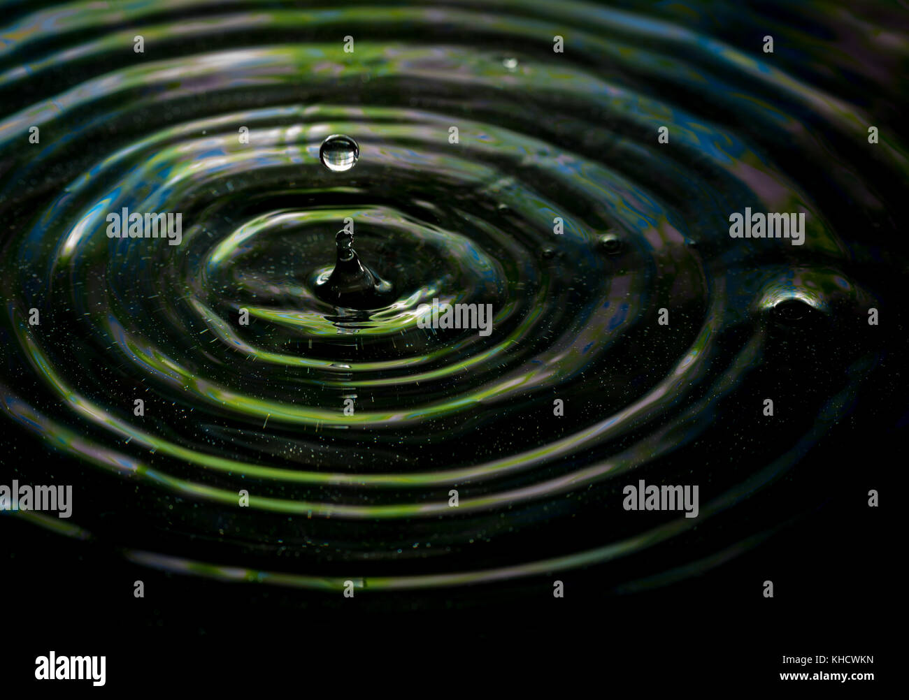water drop making ripples Stock Photo - Alamy