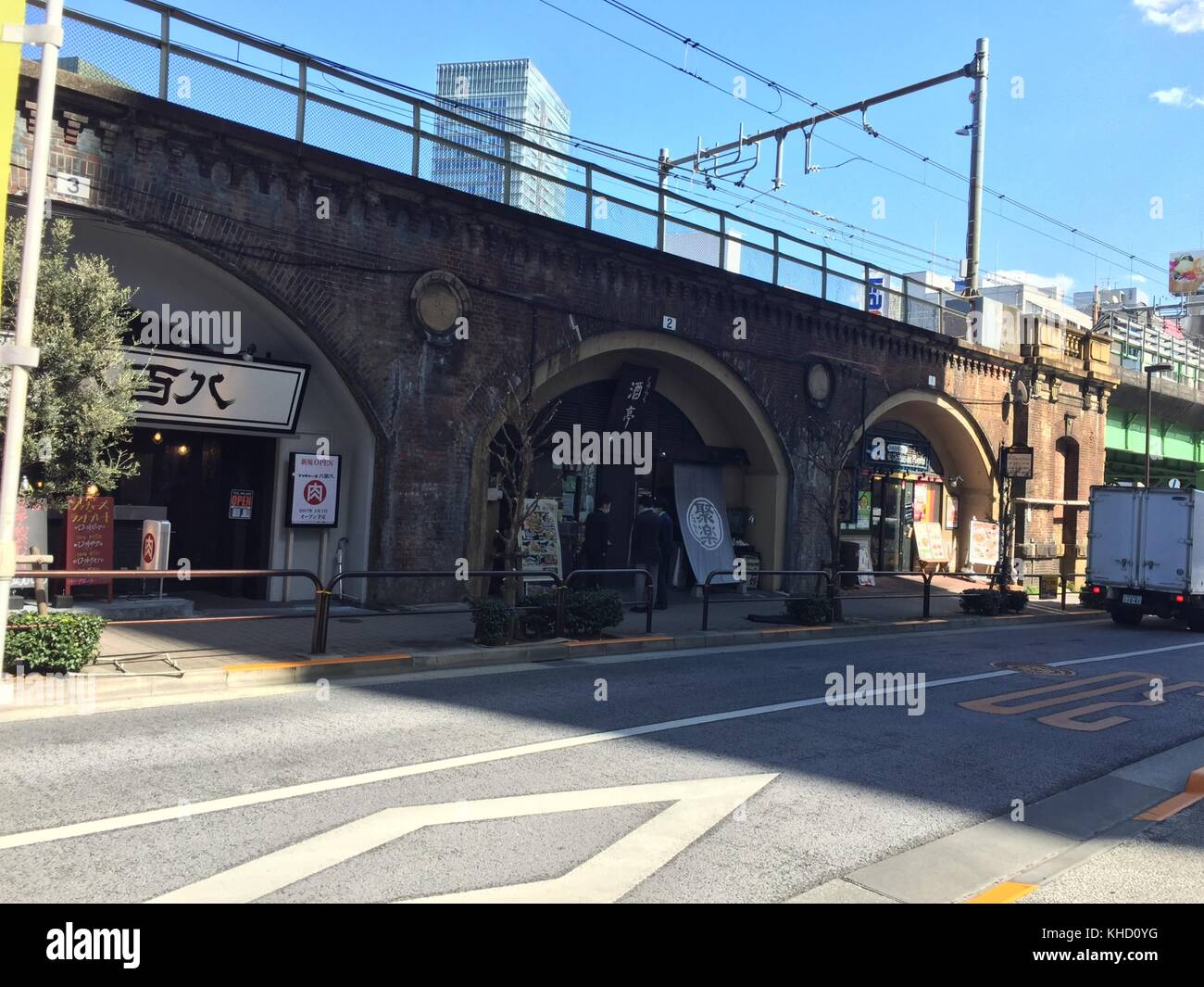 Restaurants under a bridge in Tokyo, Japan Stock Photo - Alamy