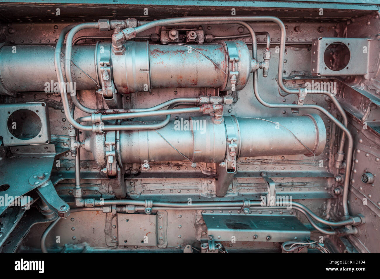Old aircraft engine closeup with rusty decaying metal pipes and bolts ...
