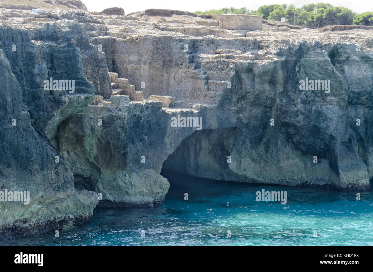 View of a rock quarry over the sea Stock Photo - Alamy
