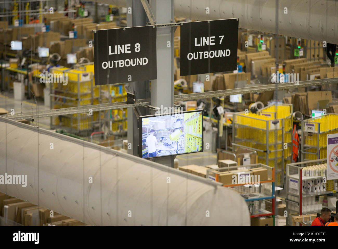 Staff at the Amazon fulfilment centre in Peterborough,Cambridgeshire,on ...