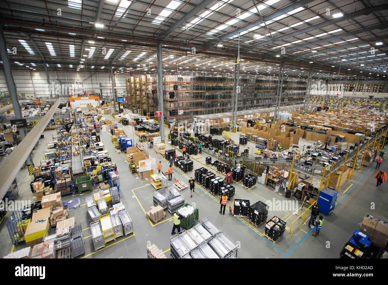 Staff at the Amazon fulfilment centre in Peterborough,Cambridgeshire,on ...