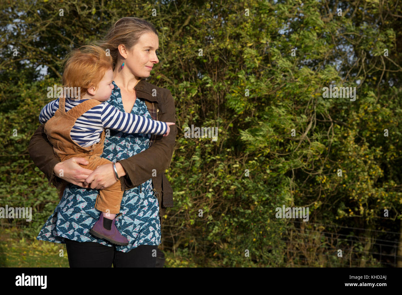 Carrying in arms hi-res stock photography and images - Alamy