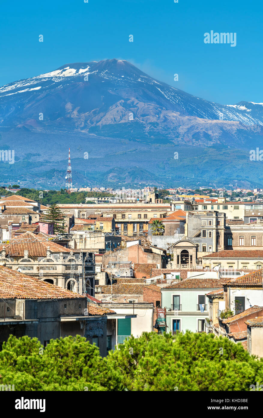 View of the historic centre of Catania with Etna Volcano in the ...