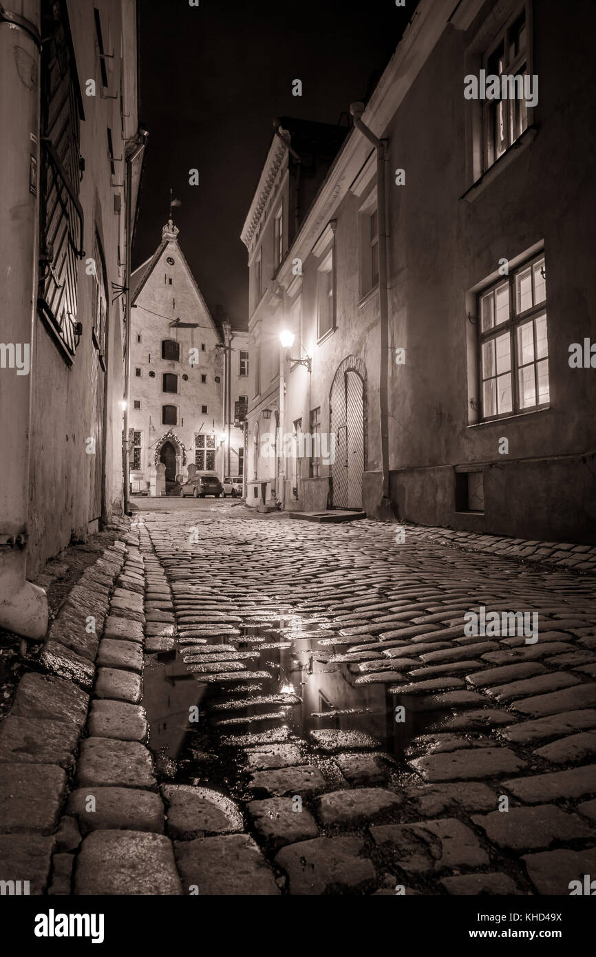 Medieval street in old town at night Stock Photo - Alamy