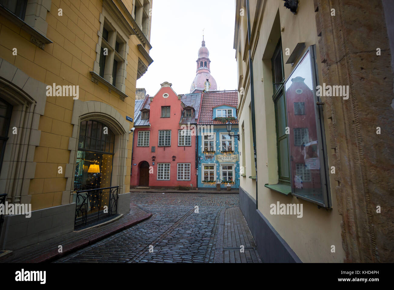 Riga's Old Town street view to the tower of the Cathedral Stock Photo ...