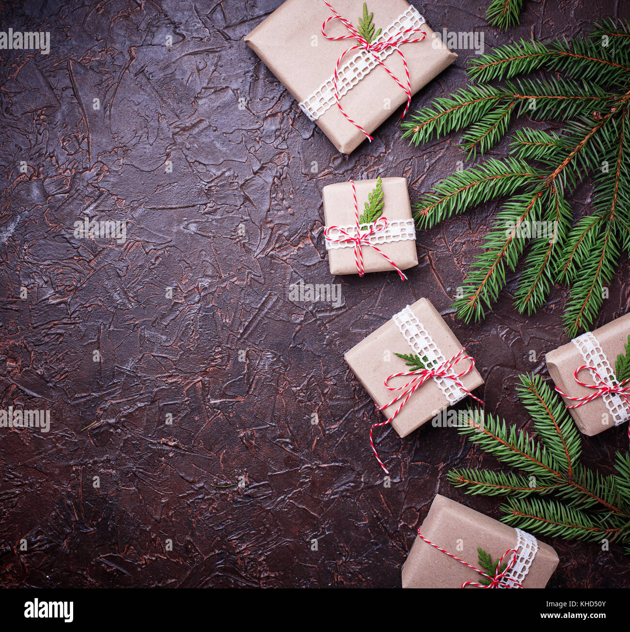 Christmas gift boxes in craft paper Stock Photo - Alamy