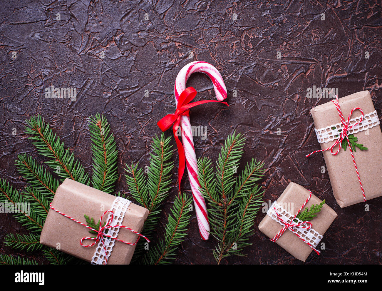 Gift boxes and candy cane Stock Photo - Alamy