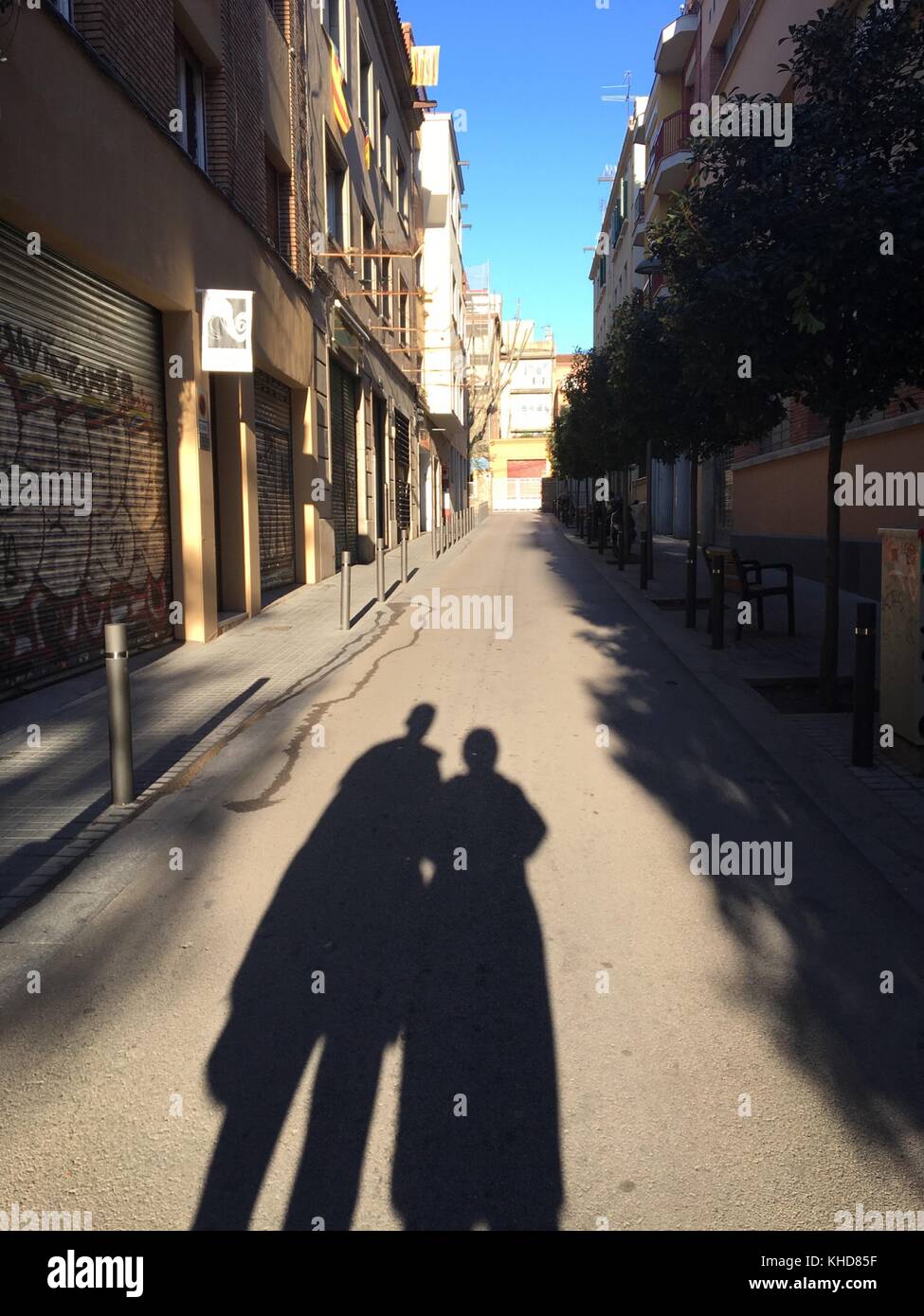 Couple taking a morning stroll in Barcelona, Spain Stock Photo - Alamy