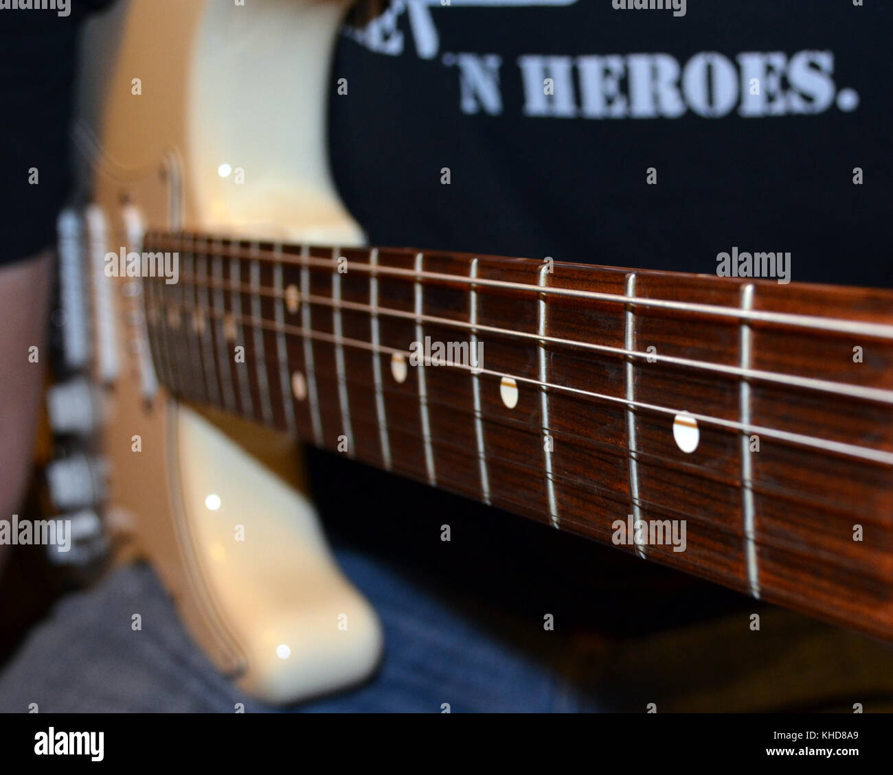 Closeup of the neck and strings of a guitar Stock Photo - Alamy