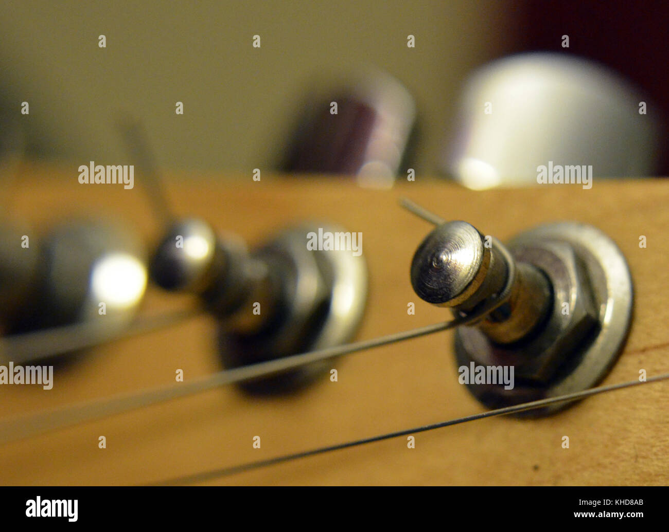 Closeup of the string knob of a guitar Stock Photo - Alamy