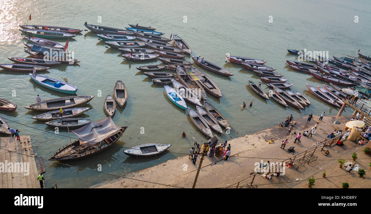 Varanasi ghat aerial view of multicolored wooden boats lined up at the ...