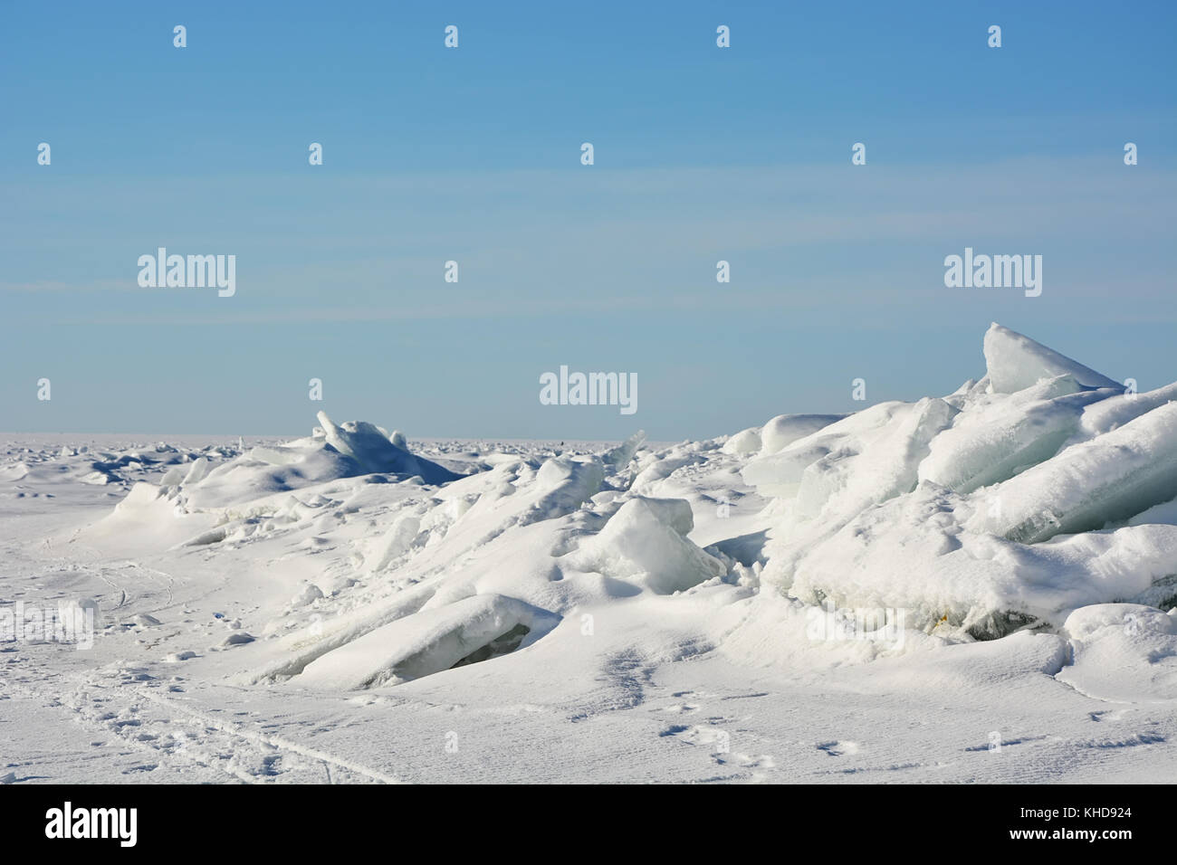 Polar landscape- frozen sea with blue sky background Stock Photo - Alamy
