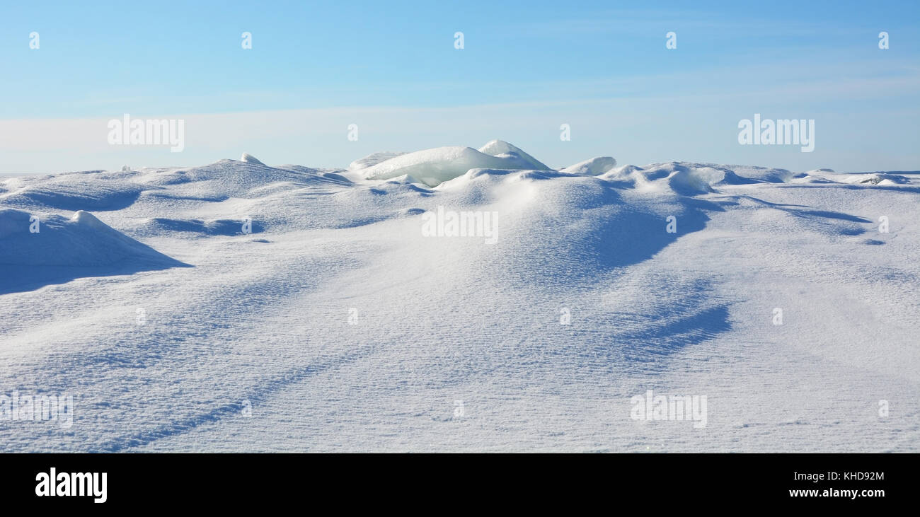 Polar landscape- frozen sea with blue sky background Stock Photo - Alamy