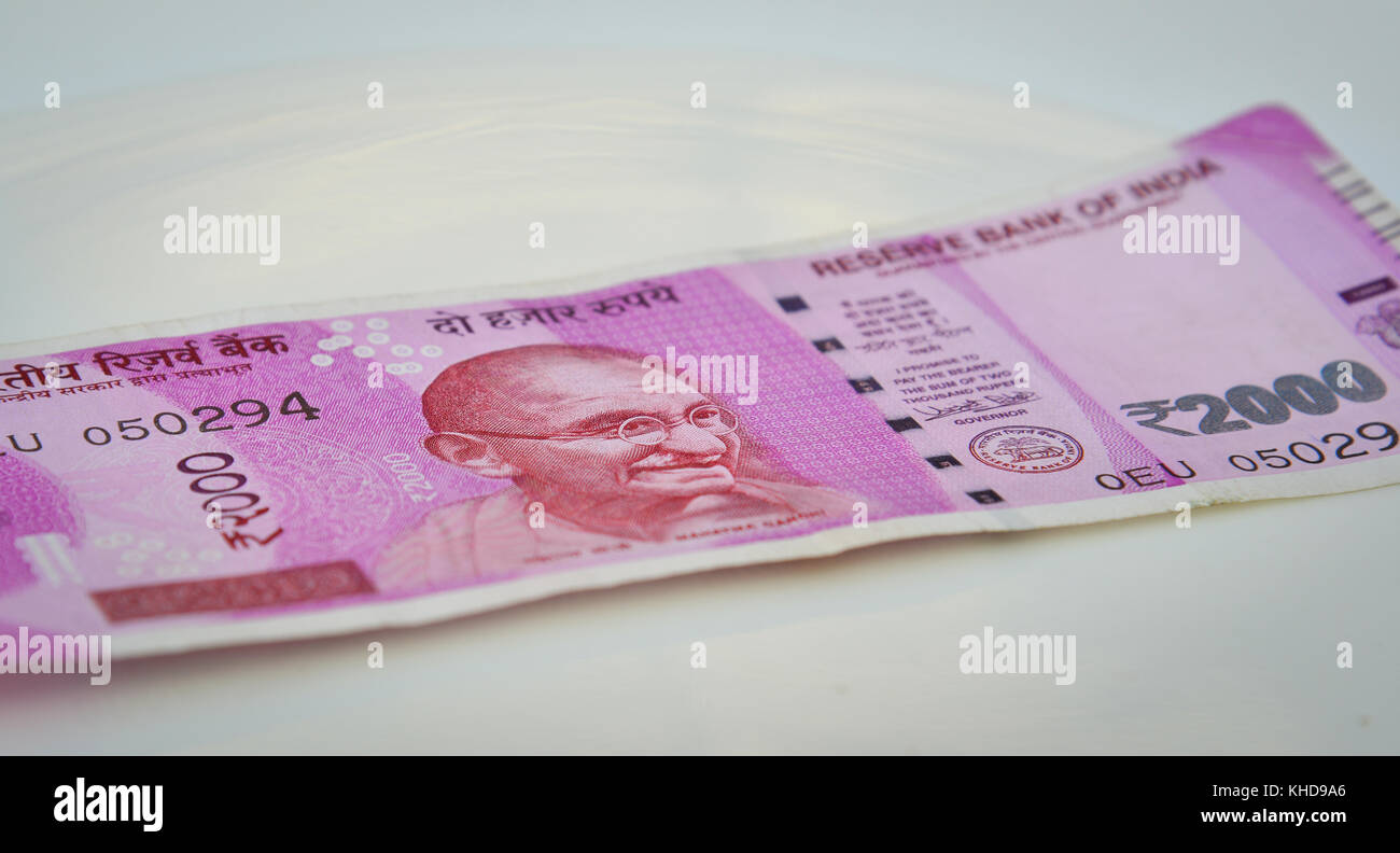 A new Indian currency note of 2000 rupees on white background isolated ...