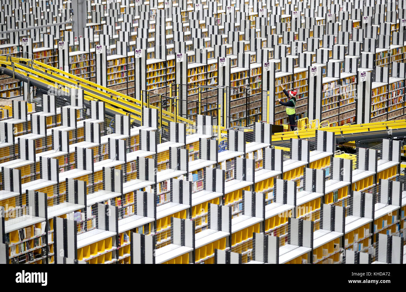 Staff make their way around the aisles collecting items before sending ...