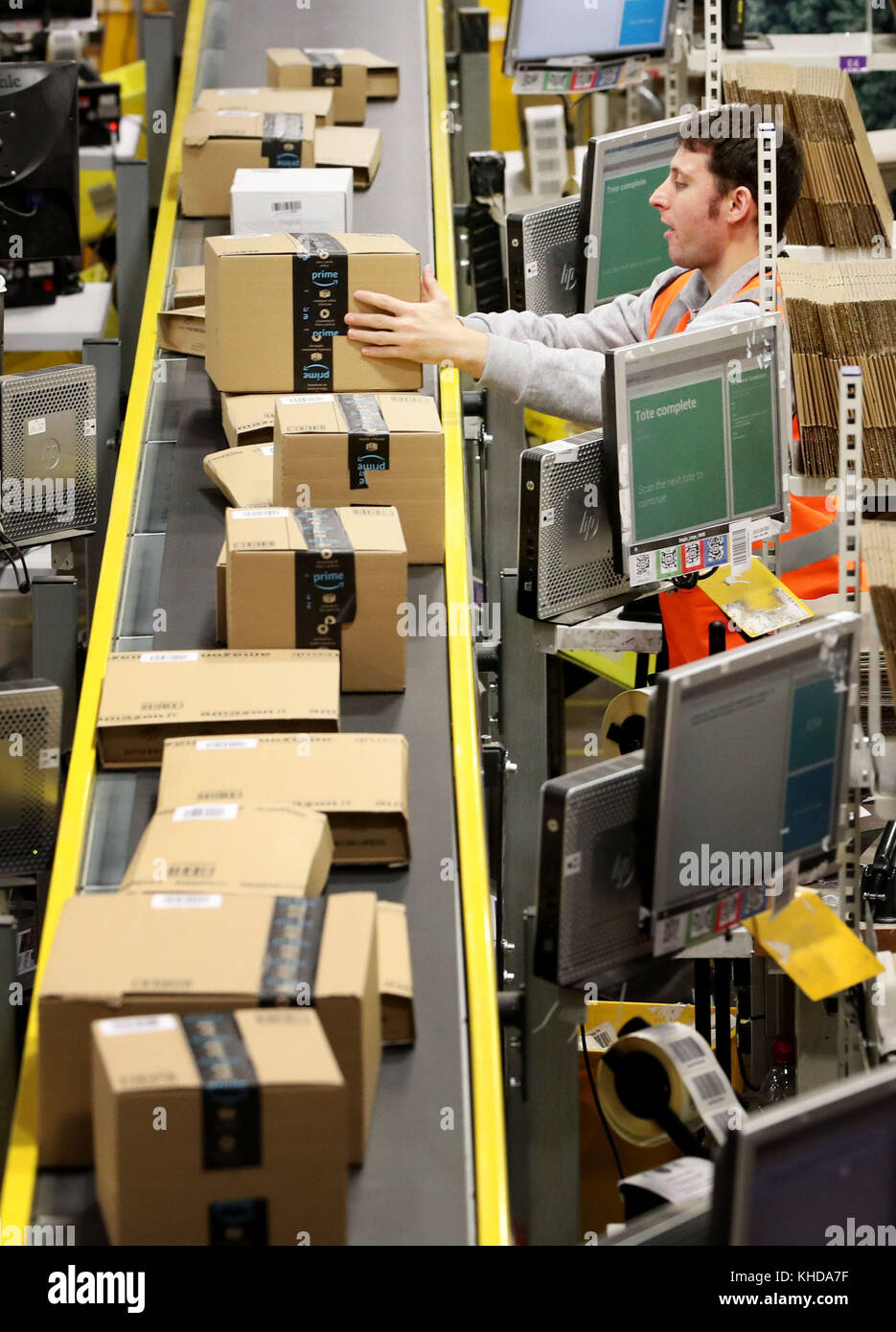 Staff label and package items in the on-site dispatch hall inside one ...
