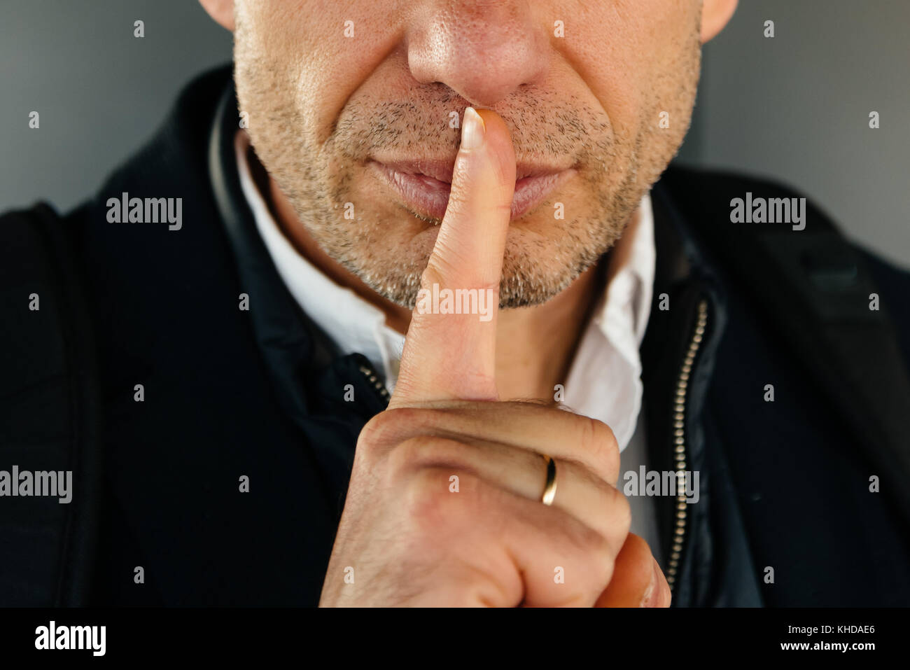 Whisper finger hi-res stock photography and images - Alamy