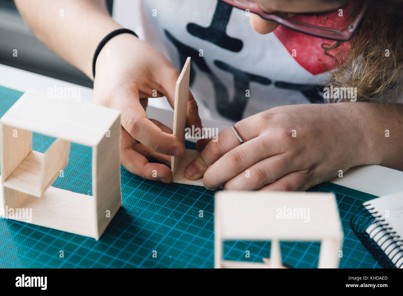 Woman architecture student working on models Stock Photo - Alamy